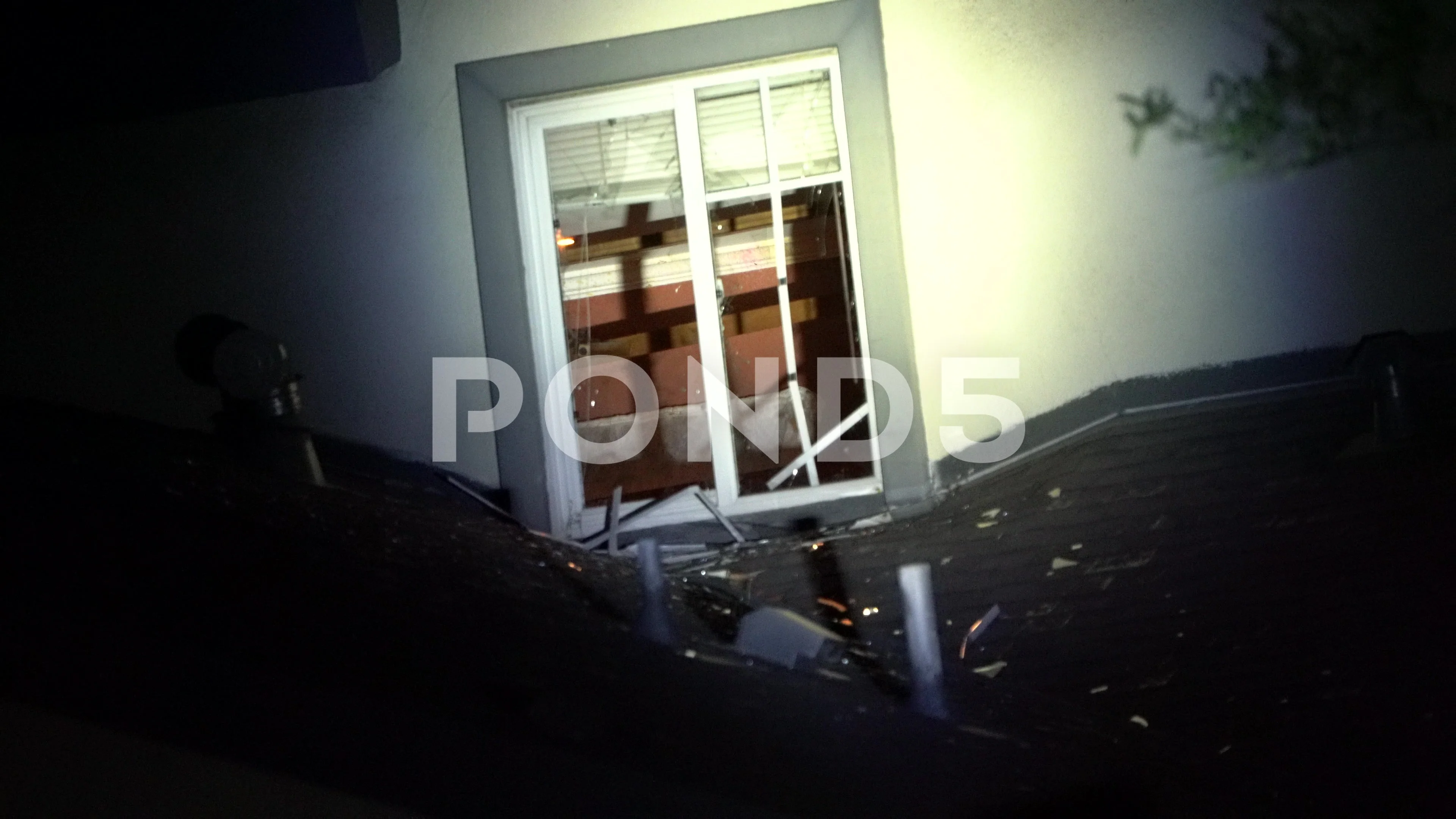 Broken House Window At Night