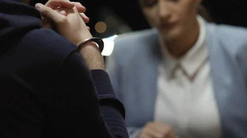 Police officer with case file in hand li... | Stock Video | Pond5