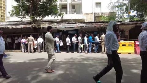 Police officer check ID cards of people. | Stock Video | Pond5