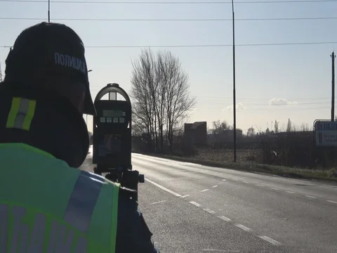 Police officer controls the speed of the... | Stock Video | Pond5