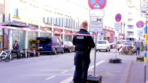 police officer cordoning off crime scene... | Stock Video | Pond5