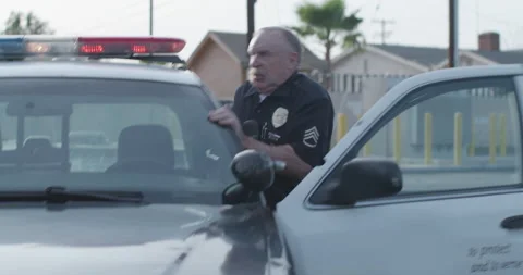 Police Officer Draws Gun On Suspect, Cop... | Stock Video | Pond5