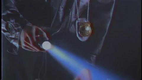 Police Officer With a Flash Light VHS Re... | Stock Video | Pond5