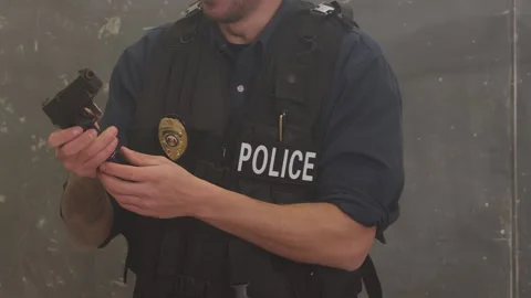 police officer giving gun safety trainin... | Stock Video | Pond5