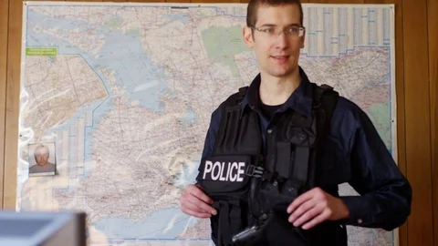 Police officer pointing at suspect photo... | Stock Video | Pond5