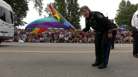 Police officer rainbow flag | Stock Video | Pond5