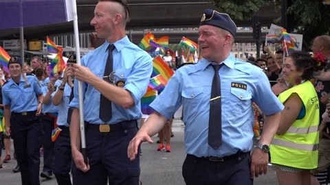 Police officer shows off dance moves at ... | Stock Video | Pond5
