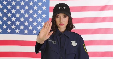 A Police Officer Shows Respect and Commi... | Stock Video | Pond5