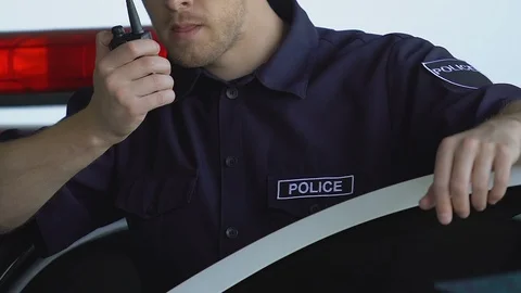 Police officer in uniform calling for ba... | Stock Video | Pond5