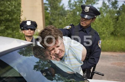 Police Officers Arresting Suspect - Stock Image - Everypixel