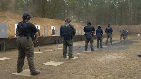 Police officers at a gun range | Stock Video | Pond5