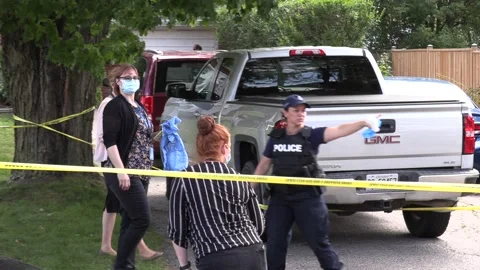 Police officers at investigate murder cr... | Stock Video | Pond5