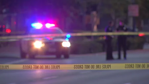 Police officers standing in crime scene ... | Stock Video | Pond5
