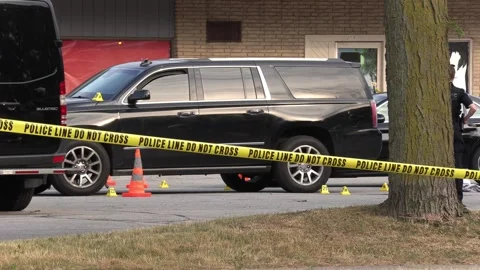 Police at the scene of mob hit and murde... | Stock Video | Pond5