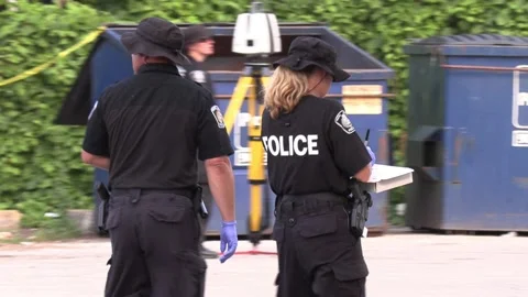 Police at the scene of mob hit and murde... | Stock Video | Pond5