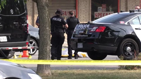 Police at the scene of mob hit and murde... | Stock Video | Pond5