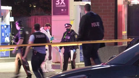 Police at scene of multiple shooting mur... | Stock Video | Pond5