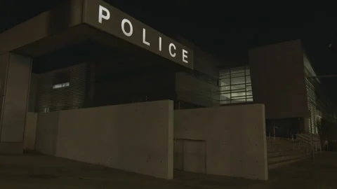 Police station logo and sign lit up at n... | Stock Video | Pond5