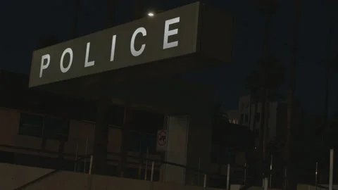 Police Station Sign by night at Los Ange... | Stock Video | Pond5