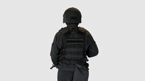 Police tactical unit with a rifle walkin... | Stock Video | Pond5