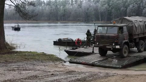 Polish Army truck driving off floating b... | Stock Video | Pond5