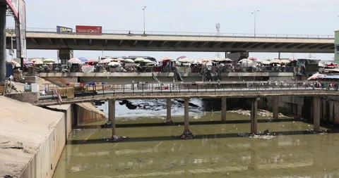 Polluted flood control river traffic bri... | Stock Video | Pond5