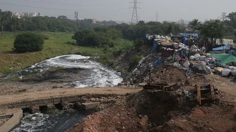 Polluted Musi river next to Slums | Stock Video | Pond5