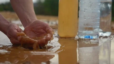 polluted water in human hands super slow... | Stock Video | Pond5