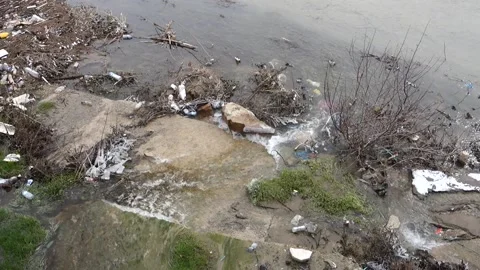 pollution of natural rivers by humans, r... | Stock Video | Pond5