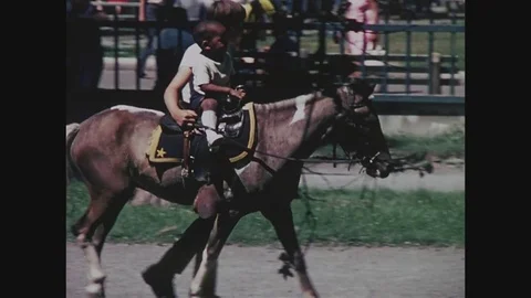 Pony ride with African American child at... | Stock Video | Pond5