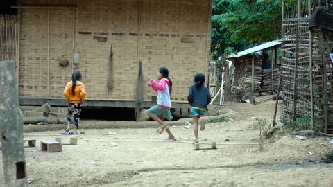 Poor children playing in the street | Stock Video | Pond5