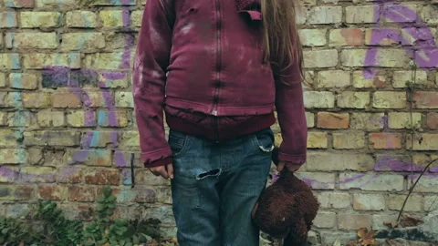 Poor, crying homeless girl standing nea... | Stock Video | Pond5