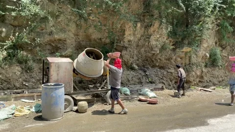 Poor INDIAN Workers Hard Working On Road... | Stock Video | Pond5
