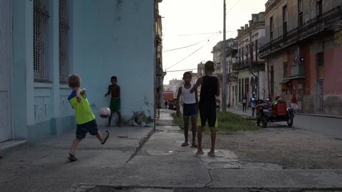 Poor kids playing football soccer in the... | Stock Video | Pond5
