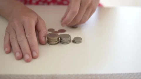 A poor man counts his last money coins a... | Stock Video | Pond5