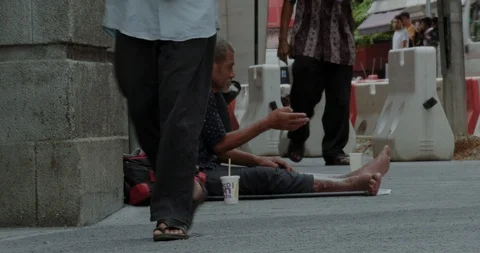 poor old homeless asian man on city stre... | Stock Video | Pond5