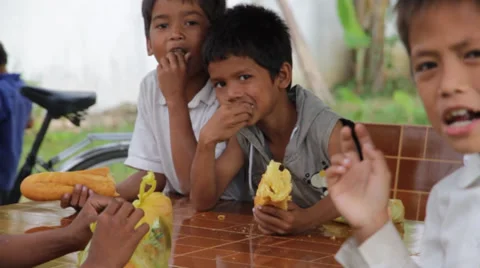 Kids Eating Bread Stock Footage ~ Royalty Free Stock Videos | Pond5
