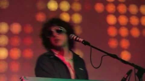 pop star on stage with colourful backgro... | Stock Video | Pond5