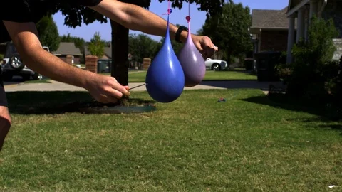 Balloon Popping Stock Footage ~ Royalty Free Stock Videos | Pond5