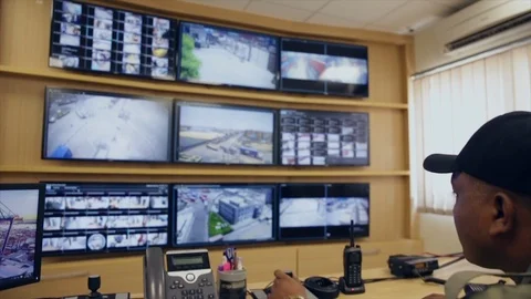 A port control room view, a uniformed of... | Stock Video | Pond5