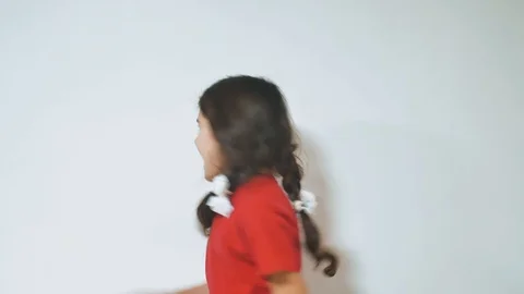 Portrait of adorable surprised little gi... | Stock Video | Pond5