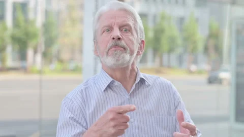 Portrait of Angry Old Man Fighting Outdo... | Stock Video | Pond5