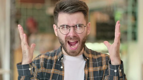 Portrait of Angry Young Man Shouting, Sc... | Stock Video | Pond5