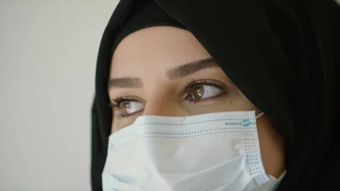 Portrait of an arab woman wearing a mask... | Stock Video | Pond5