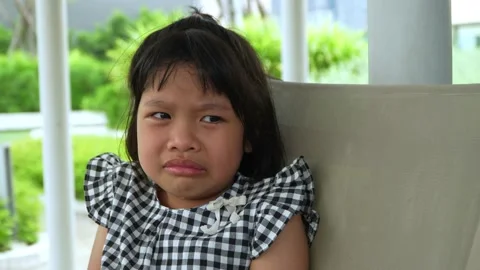 Portrait of Asian angry, sad and cry lit... | Stock Video | Pond5