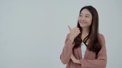Portrait asian beautiful girl pointing b... | Stock Video | Pond5