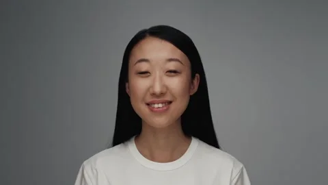 Portrait of Asian Woman Raising Head Ope... | Stock Video | Pond5