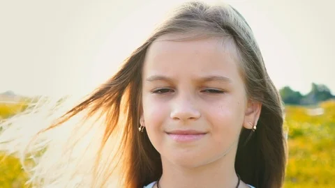 Portrait of attractive little girl with ... | Stock Video | Pond5