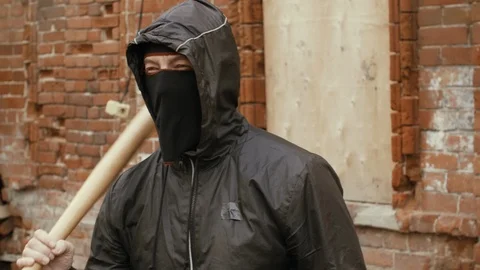 Portrait of bandit with mask and basebal... | Stock Video | Pond5