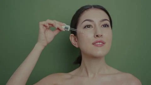 portrait of a beautiful Asian woman drip... | Stock Video | Pond5